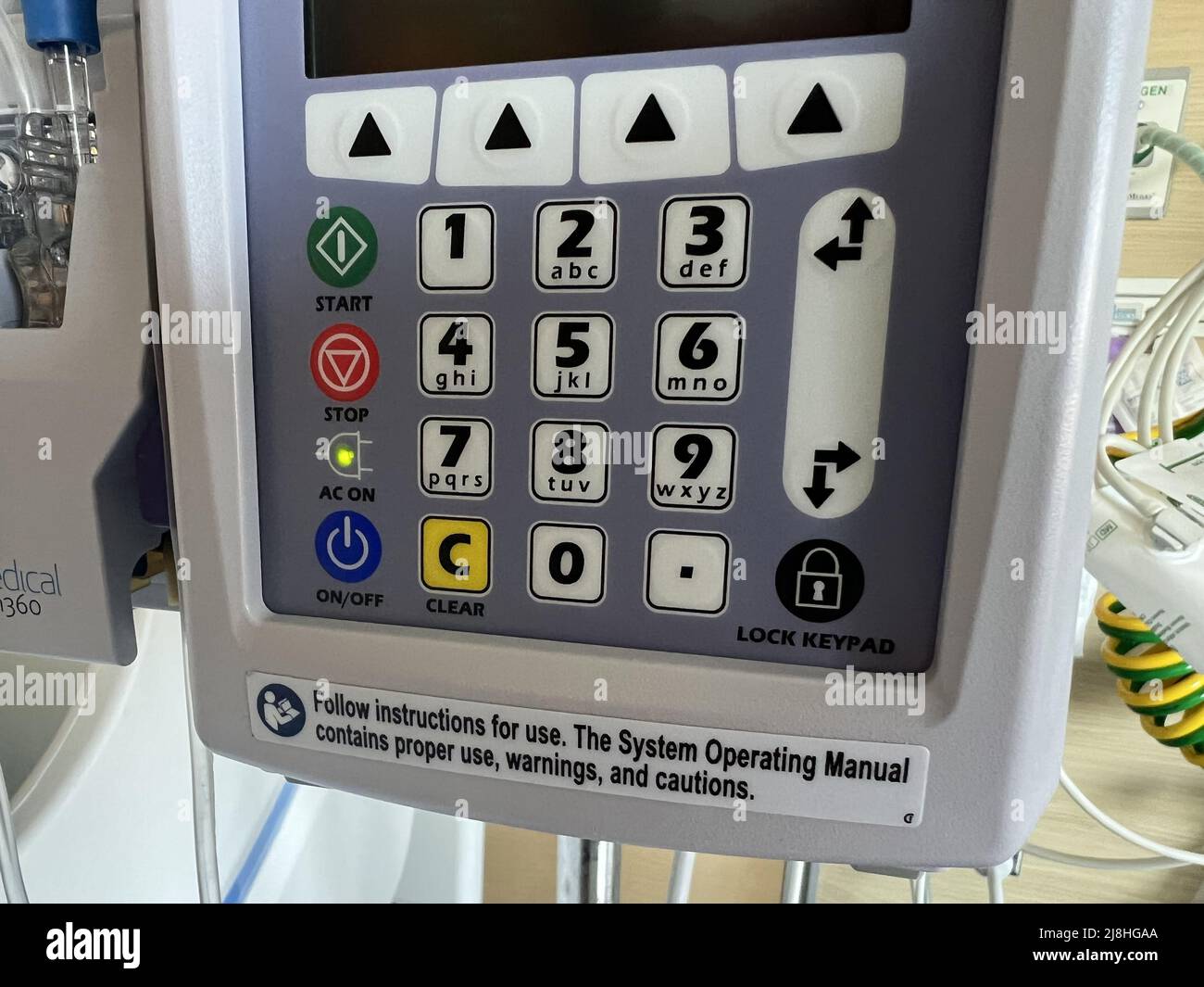 Close-up of an ICU Medical intravenous infusion pump in a hospital ...