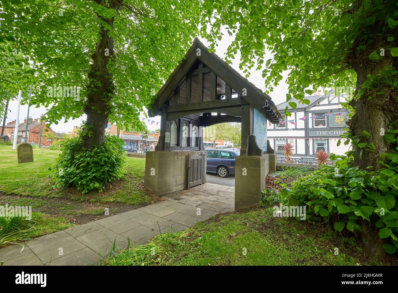 Old style covered entrance to a church Stock Photo - Alamy
