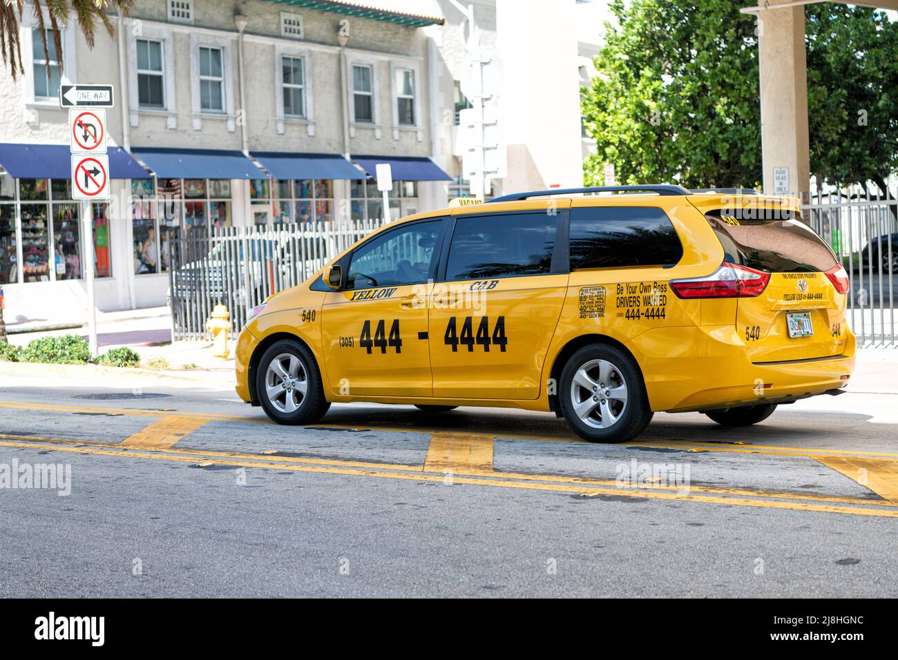 Miami Beach, Florida USA - April 14, 2021: toyota yellow cab taxi car ...