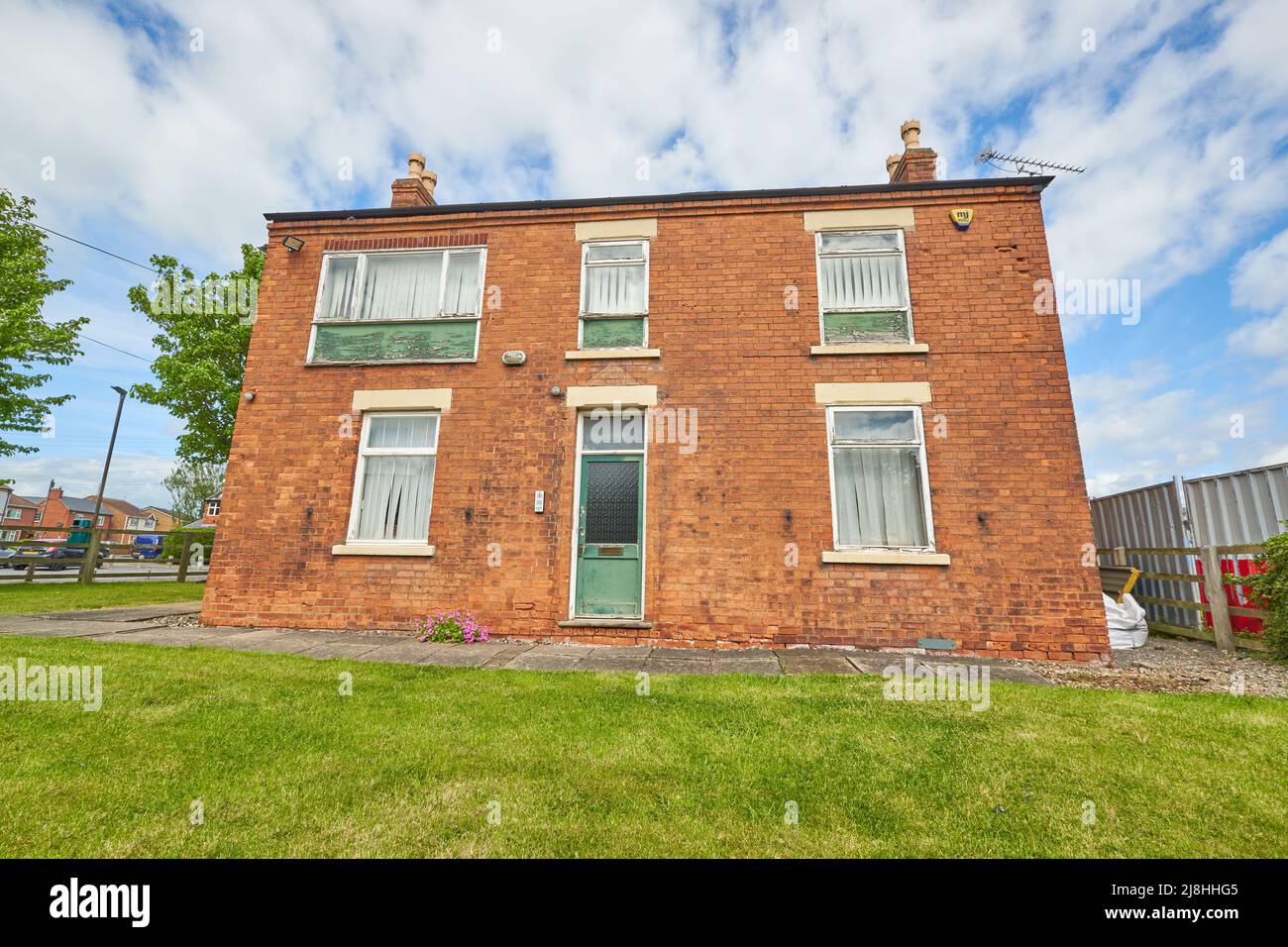 Old abandoned detached house example Stock Photo - Alamy