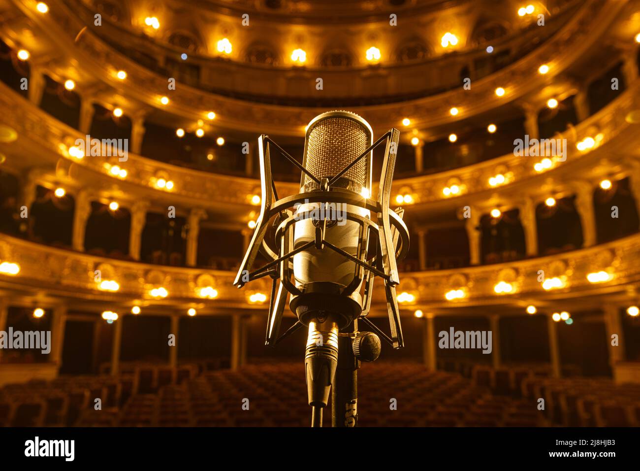 Microphone on stage spotlight audience hi-res stock photography and ...
