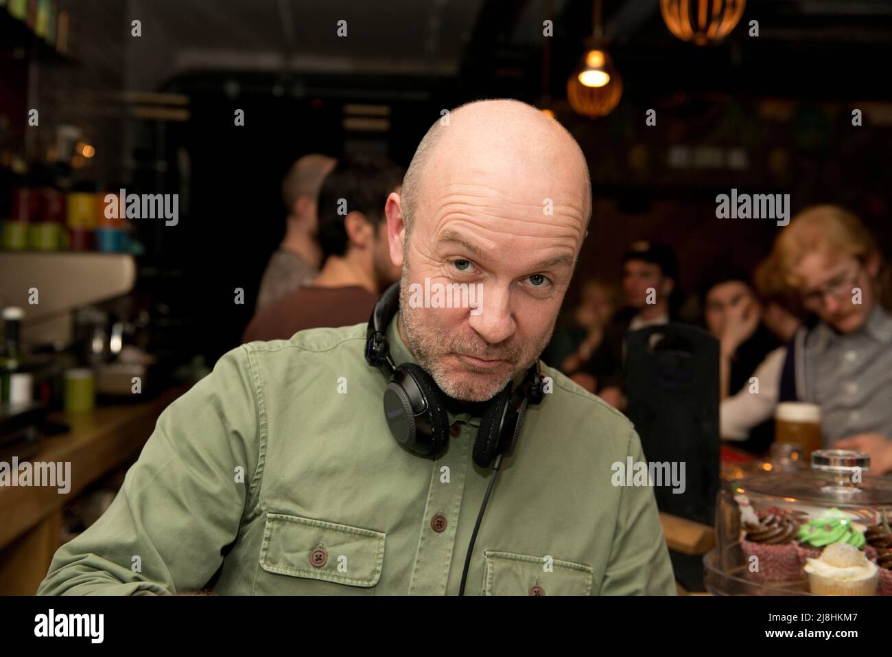 DJ James Holroyd mixing music with his headphones on in Leeds at ...