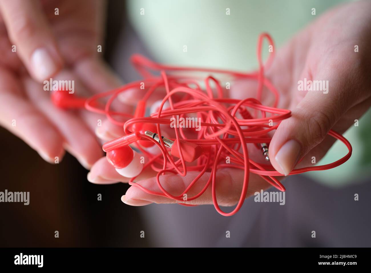 Headphone wire knot hi-res stock photography and images - Alamy