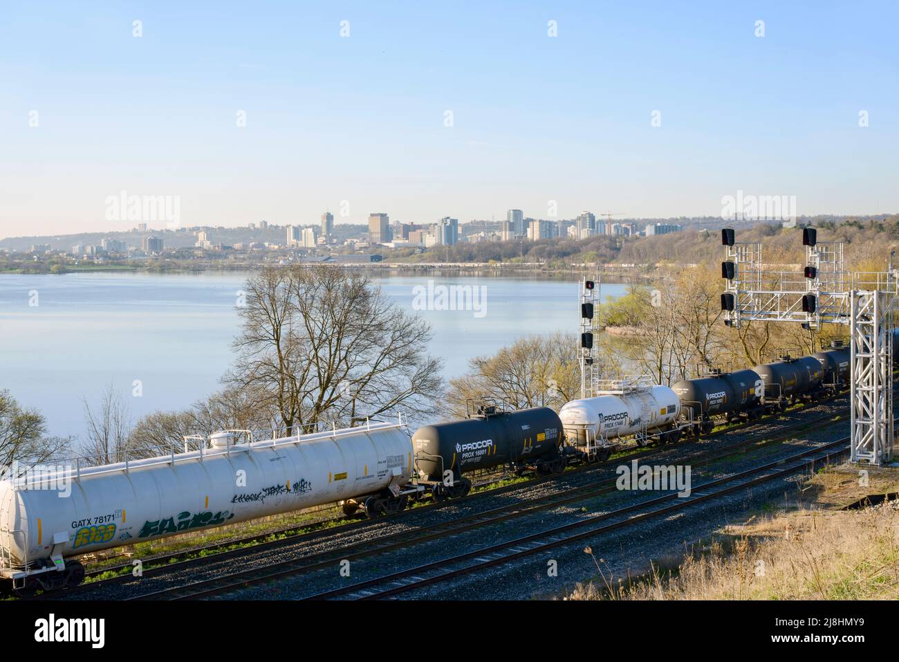 A landscape photo a freight train overlooking the Hamilton Harbour on ...