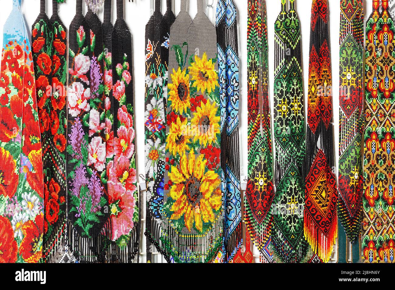 Handmade beautiful necklaces made of beads of various colors and ...