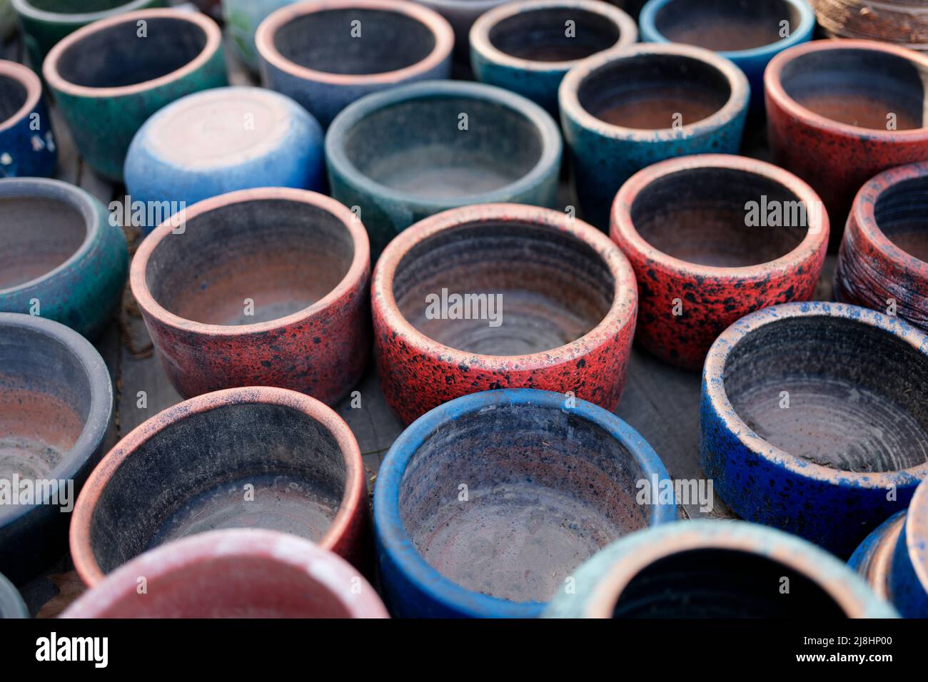 Used empty ceramic flower pots in greenhouse or hothouse Stock Photo ...