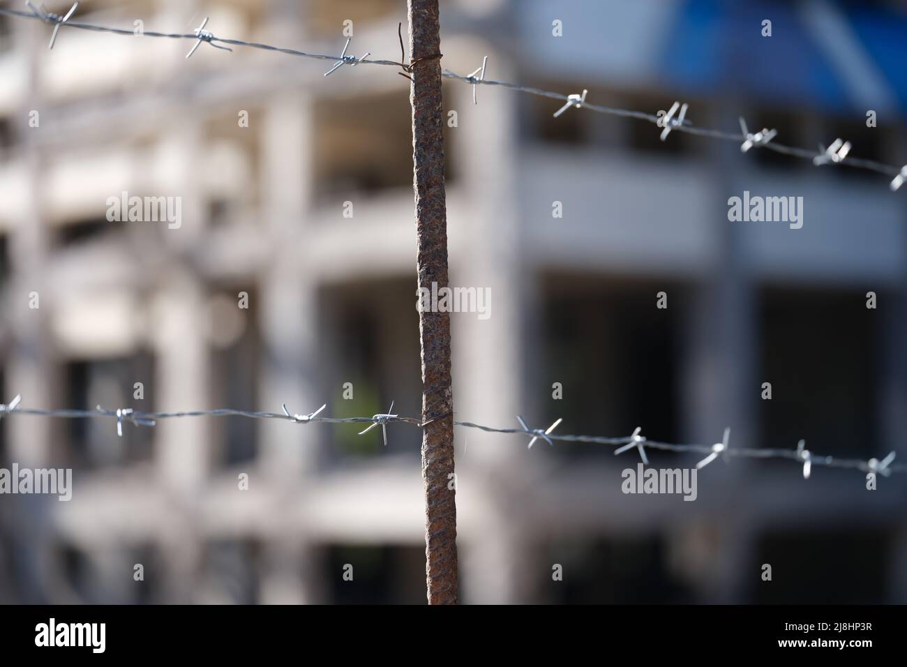 Security barbedwire fence, wire with clusters of short, sharp spikes ...