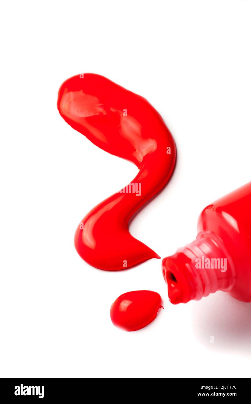 Close-up of an open tube of artist paint with red acrylic paint ...
