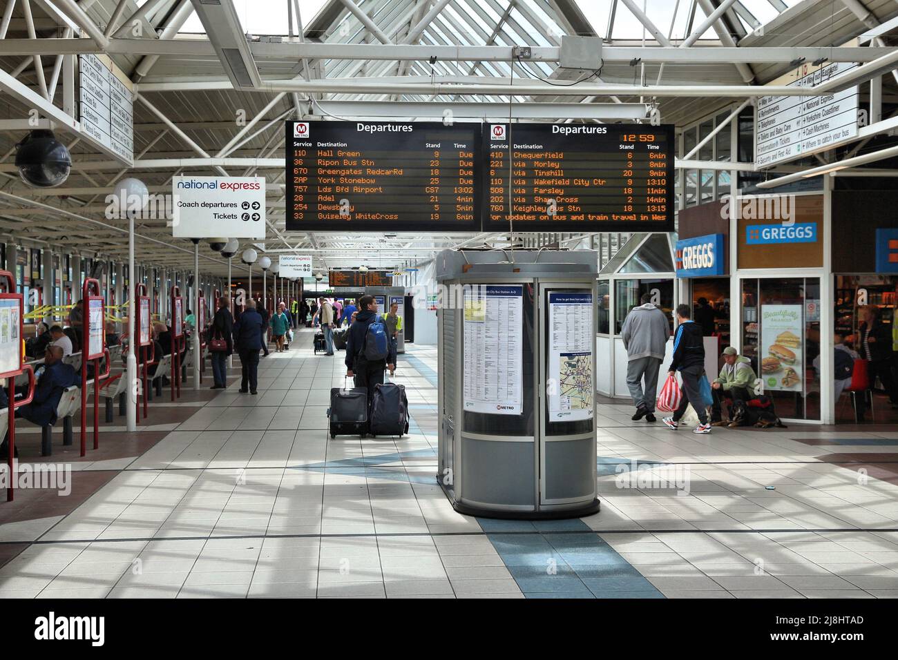 LEEDS UK JULY 11 2016 Passengers Wait At Leeds City Bus Station In