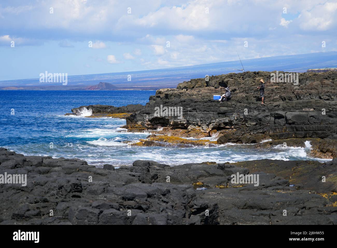 Waves crashing on the lava rocks of South Point Park, the southernmost ...