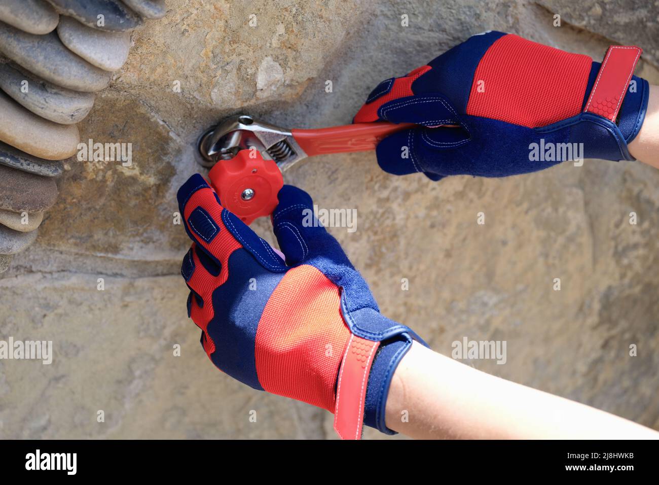 Worker using wrench hi-res stock photography and images - Alamy