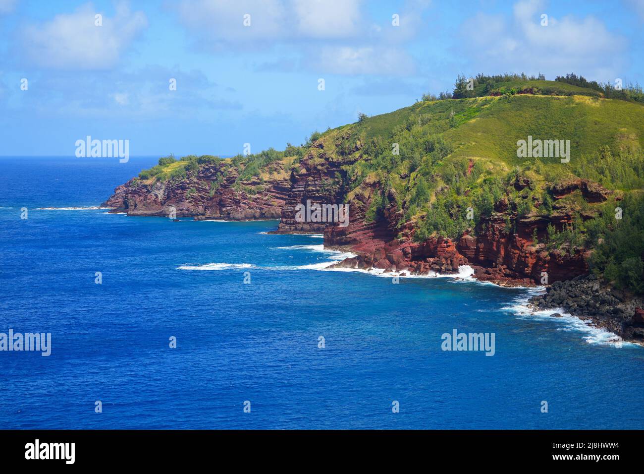 Red cliffs in Honokohau Bay between the Kahekili and Honoapiilani ...