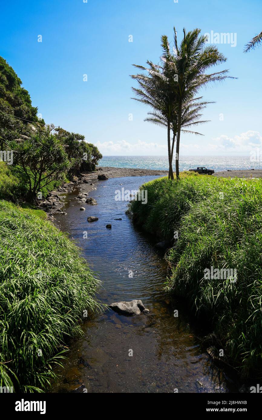 View of the Pacific Ocean above Alelele stream at the junction between ...
