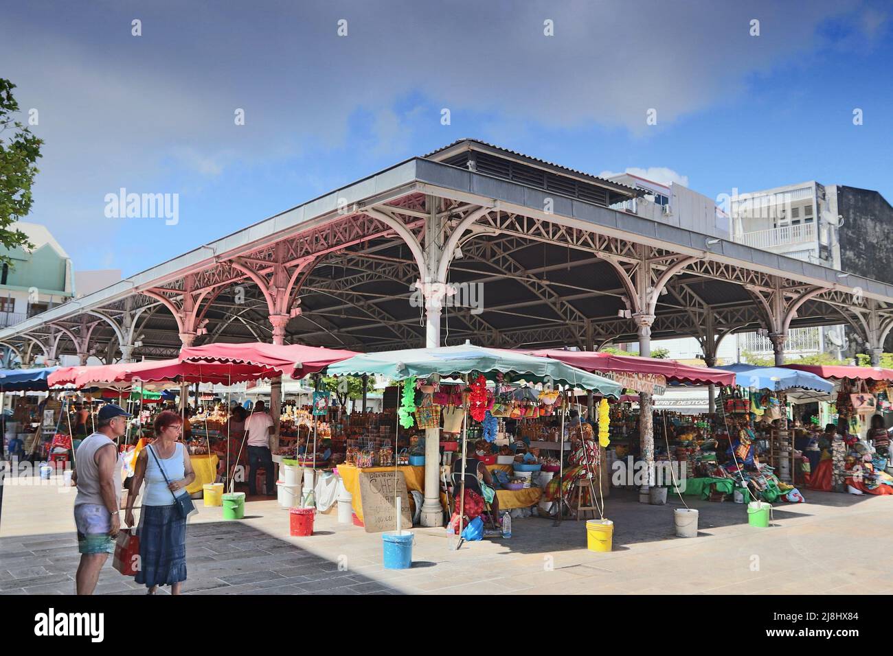 GUADELOUPE, FRANCE - DECEMBER 6, 2019: People visit local market place ...