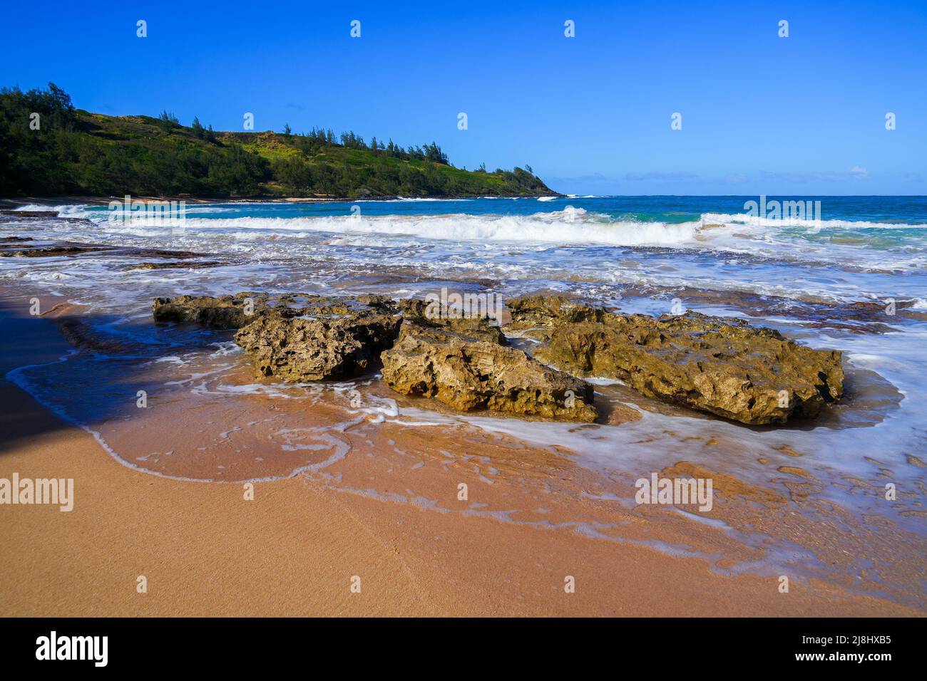 Rocks on Moloa'a beach on the North Shore of Kauai island in Hawaii ...