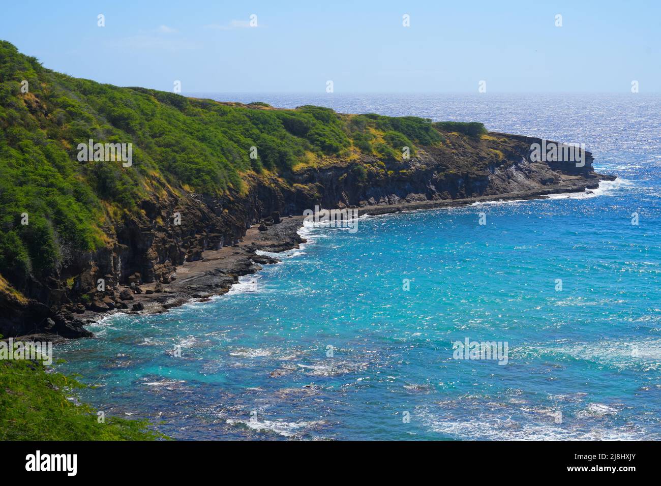 Rocky cliffs in the Hanauma Bay Nature Preserve on O'ahu island in ...