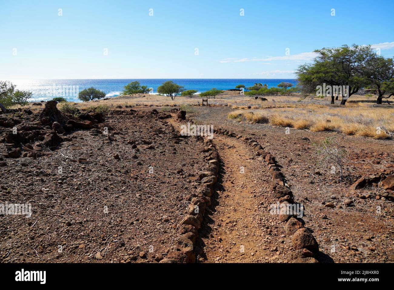 Rocky trail path leading to the ancient fishing village in ruins in the ...