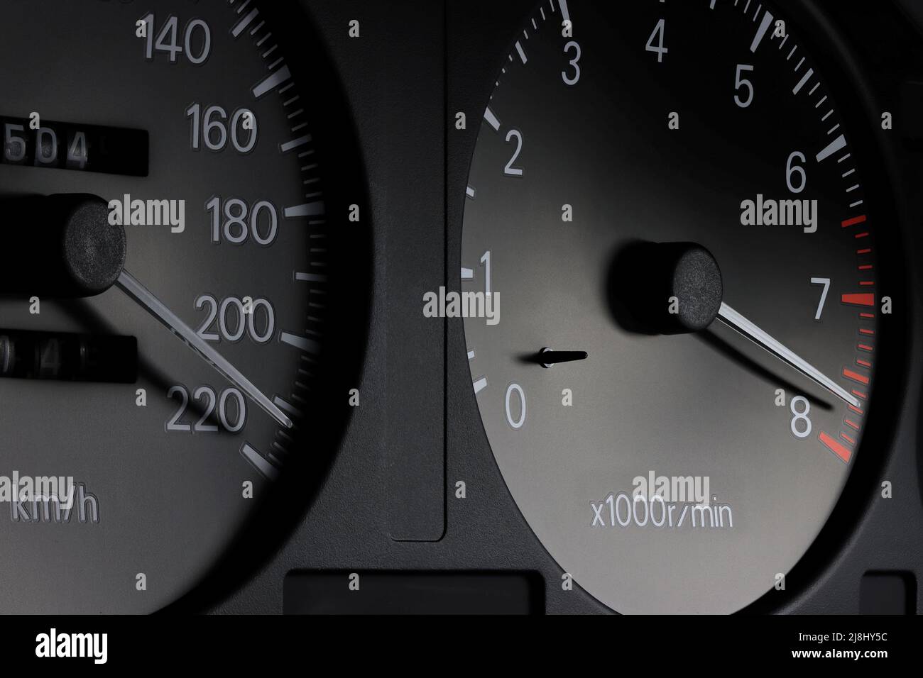 tachometer and speedometer in car dashboard at full power Stock Photo ...