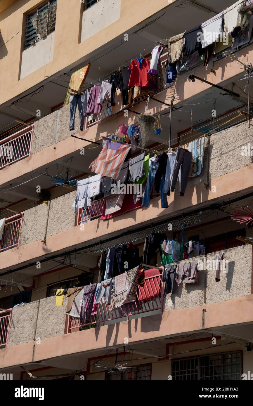 Clothes drying in the sun in balconies of municipal apartment buildings ...