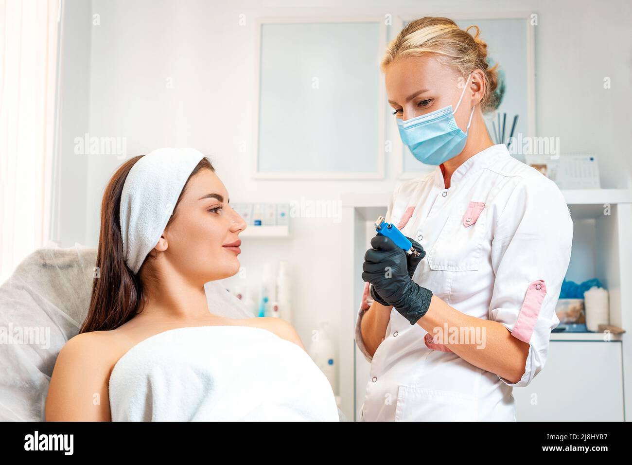 Body piercing procedure hi-res stock photography and images - Alamy