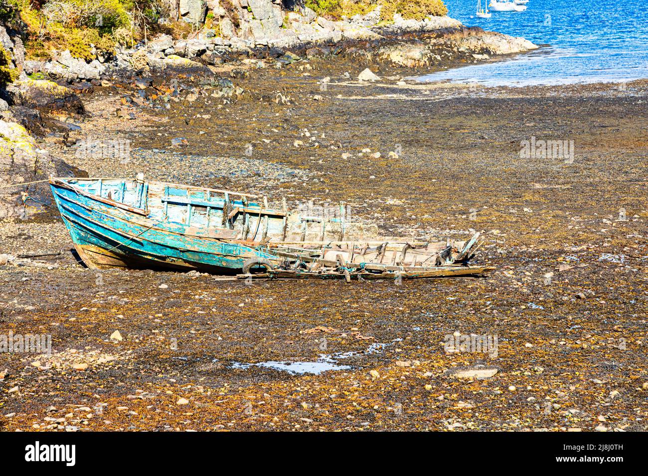 Shipwrecked fishing boat on Loch Carron with stunning views overlooking ...