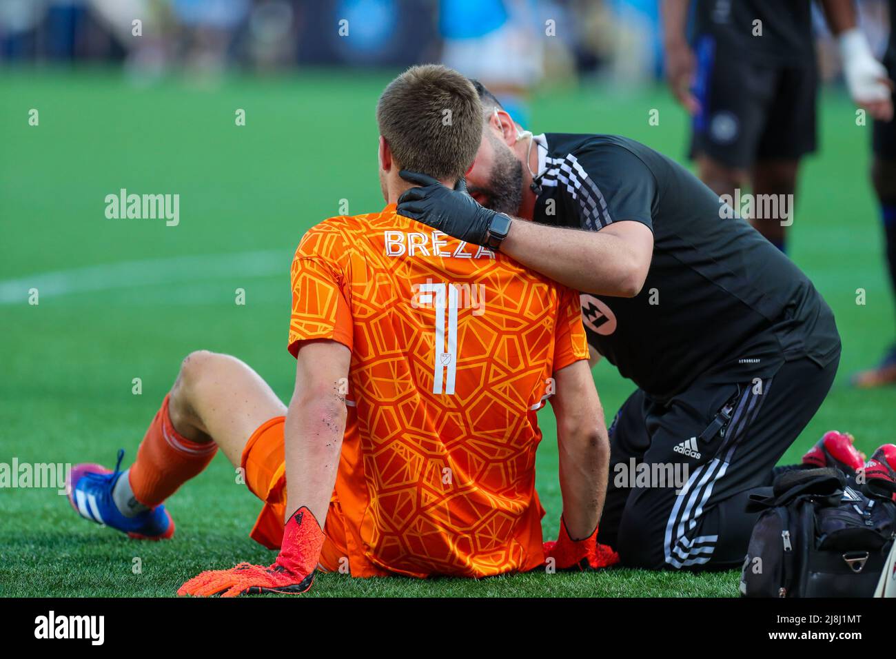 CHARLOTTE, NC - MAY 14: A Team doctor talks with an injured Sebastian ...