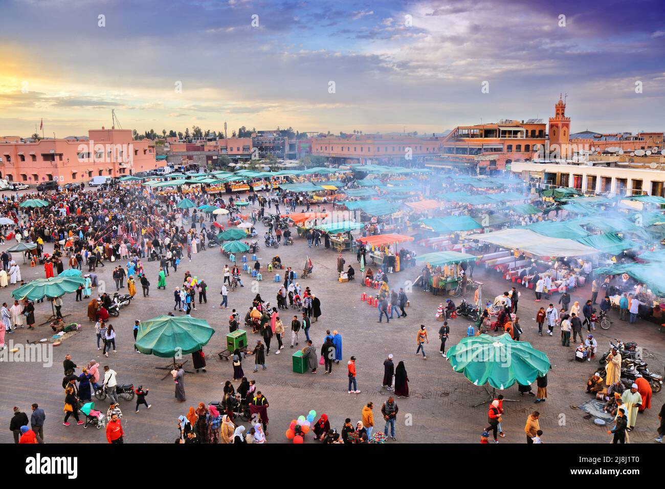 MARRAKESH, MOROCCO - FEBRUARY 20, 2022: People visit Jemaa el-Fnaa ...