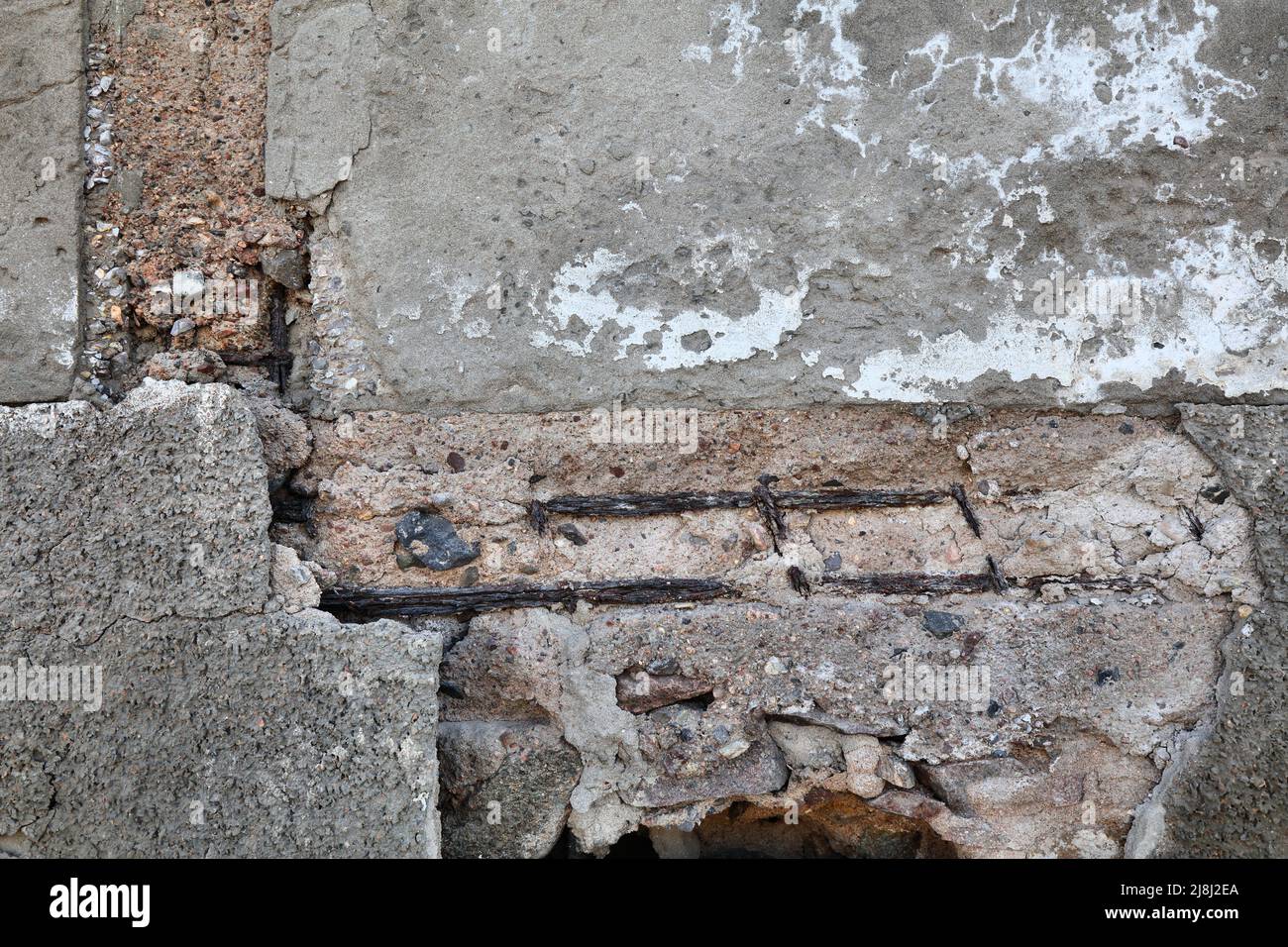 Spalling damage in reinforced concrete in seaside humid salty air ...