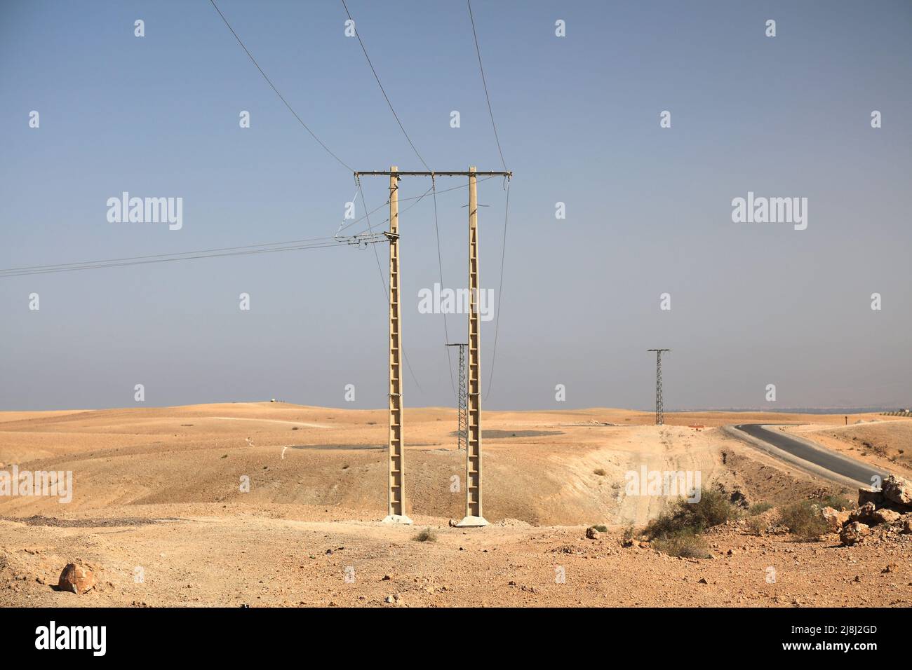 Electric grid in Agafay desert landscape near Marrakech, Morocco Stock ...