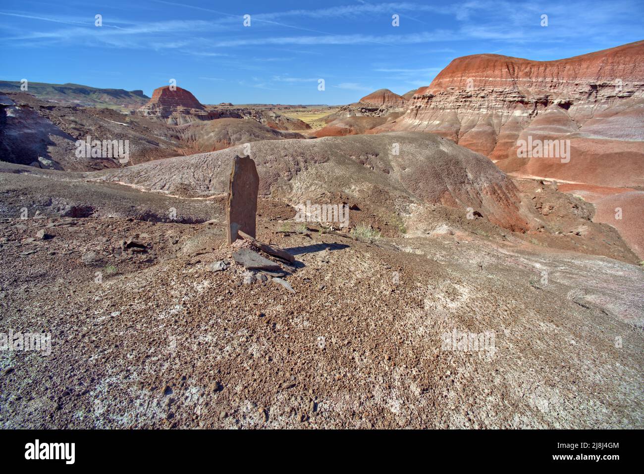 A vertical slab of stone that marks Tombstone Hill in Petrified Forest ...