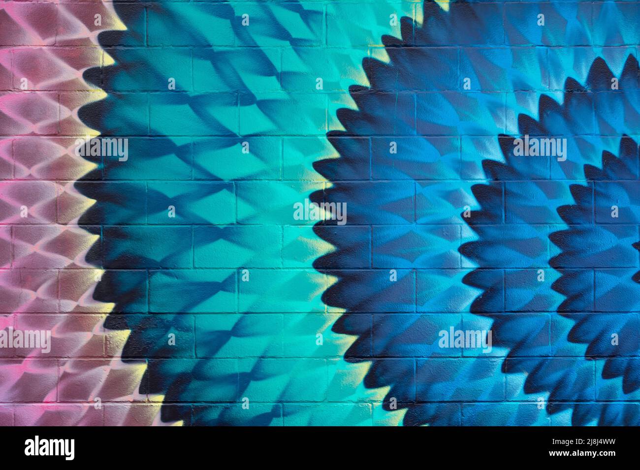 Colorful painted block wall in city alley Stock Photo - Alamy