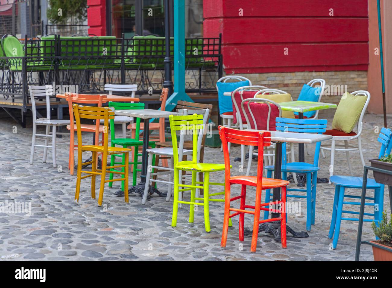 Colourful wooden tables hi-res stock photography and images - Alamy