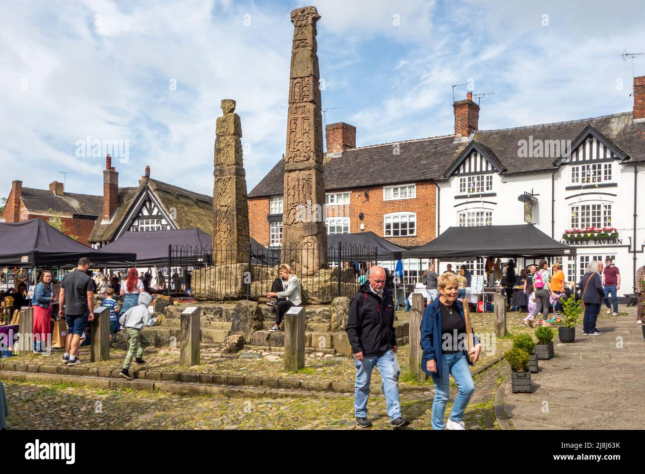 People at the farmers and makers market around the ancient Saxon ...