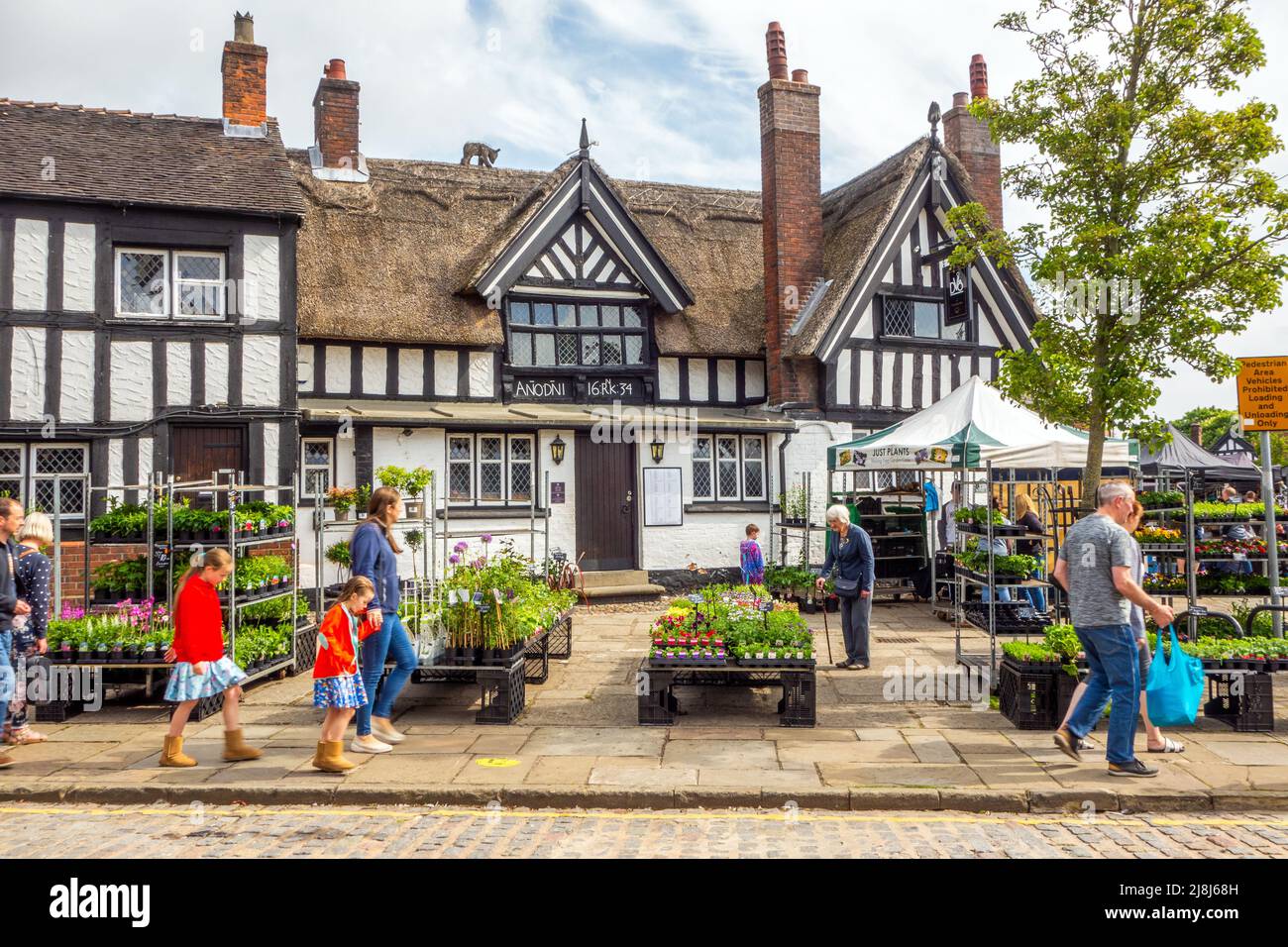 People outside the Black Bear inn at the farmers makers market in the ...