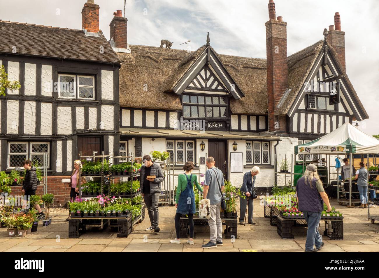 People outside the Black Bear inn at the farmers makers market in the ...