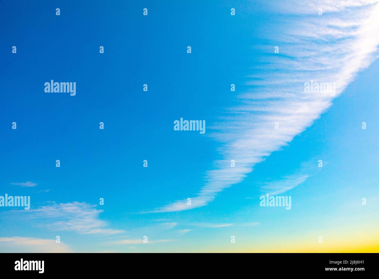 background of blue sky with small soft clouds as harmonic background ...