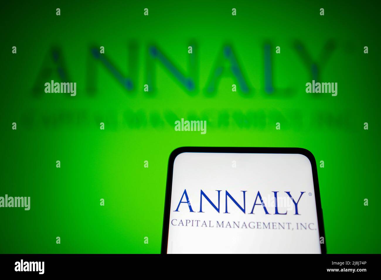 In this photo illustration the Annaly Capital Management logo seen ...