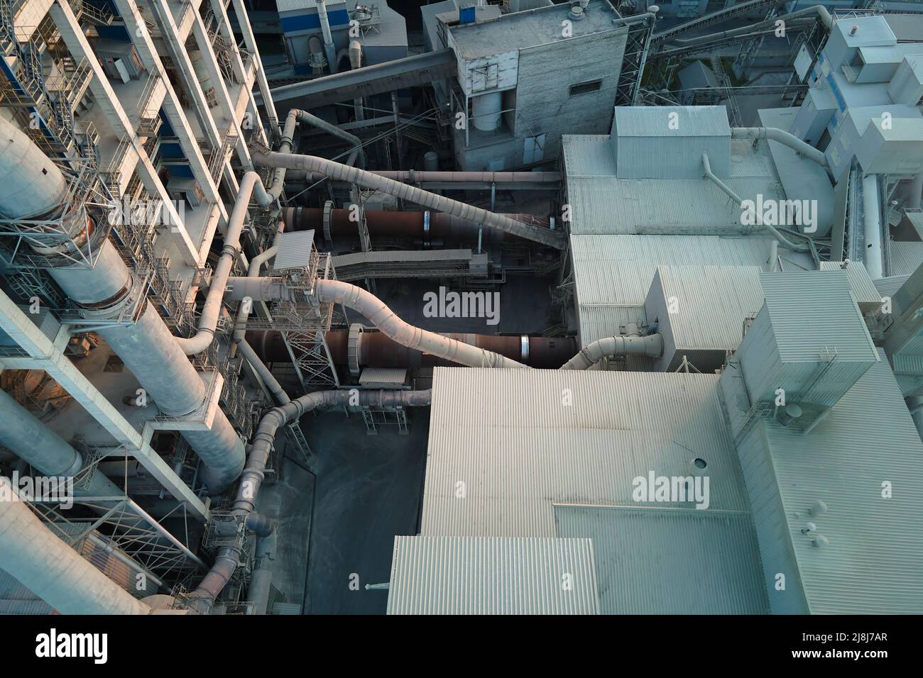 Aerial view of cement factory with high concrete plant structure and ...