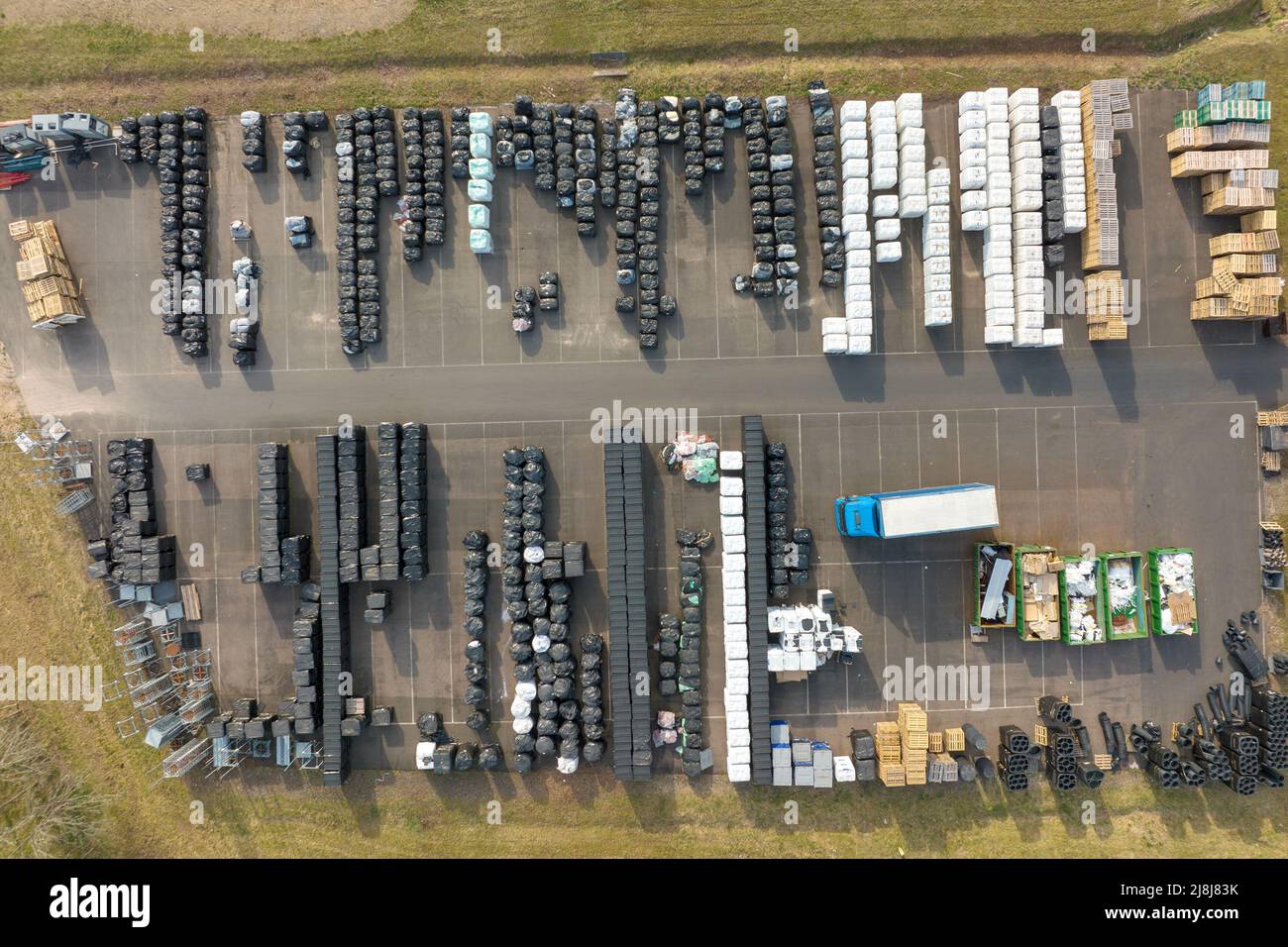 Aerial view of goods storage on warehouse yard and logistics center in ...