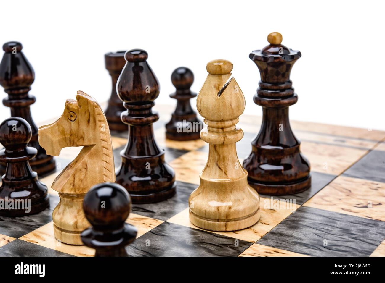 Beige Brown birch Wooden chess different pieces figures standing on ...