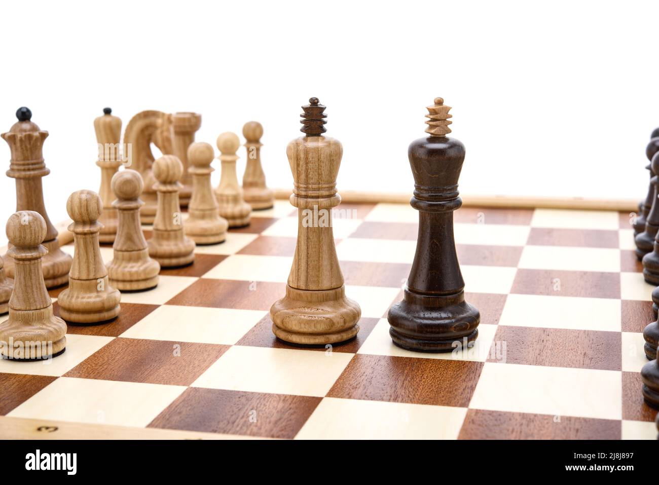 Beige Brown Wooden chess different pieces figures standing on ...