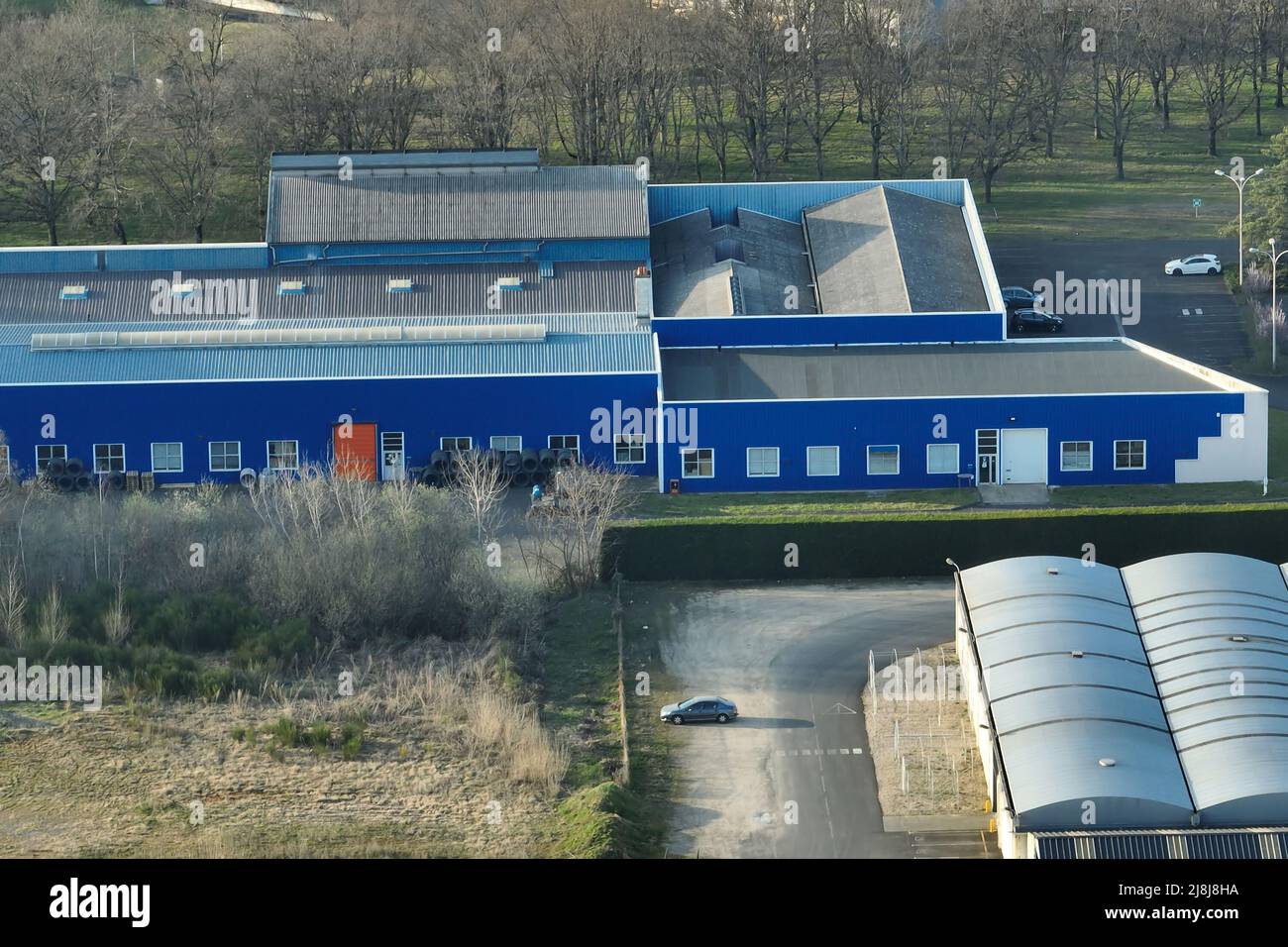 Aerial view of new factory building for producing and shipping of ...
