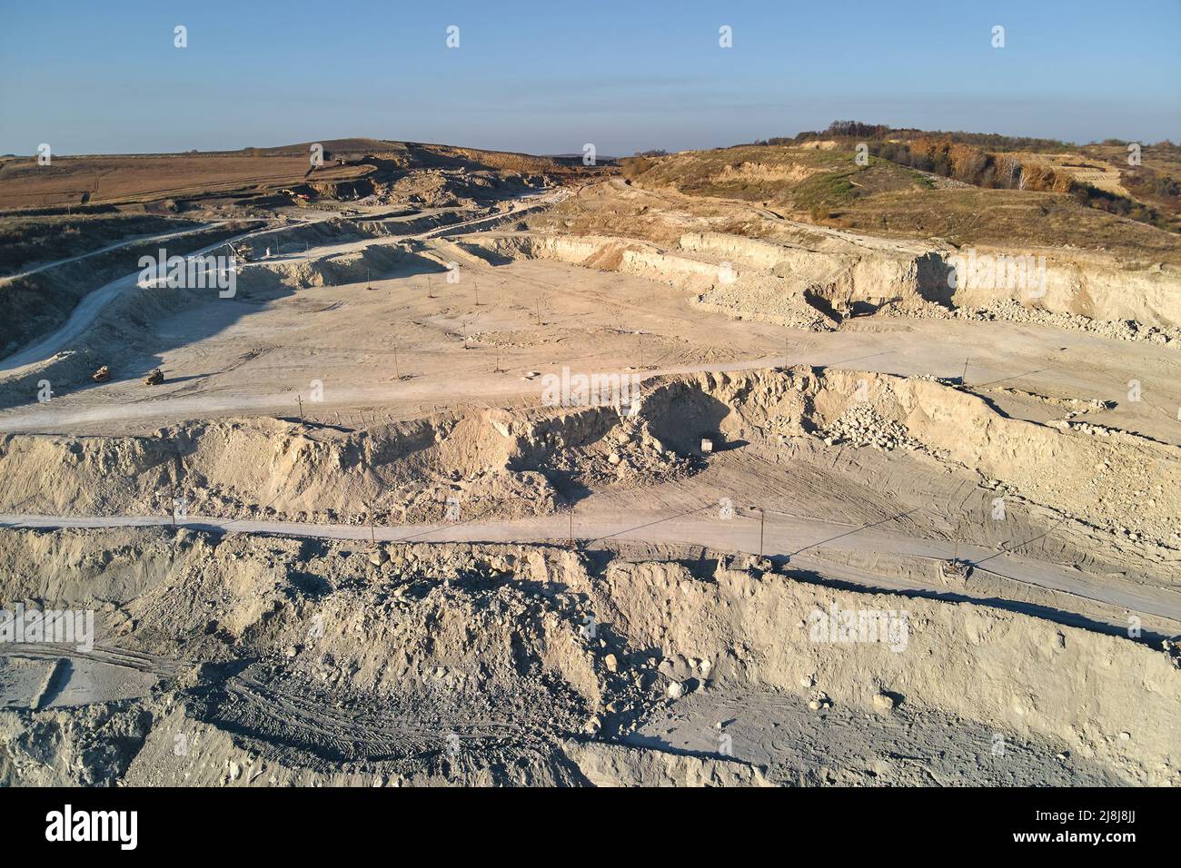 Aerial view of open pit mining site of limestone materials for ...