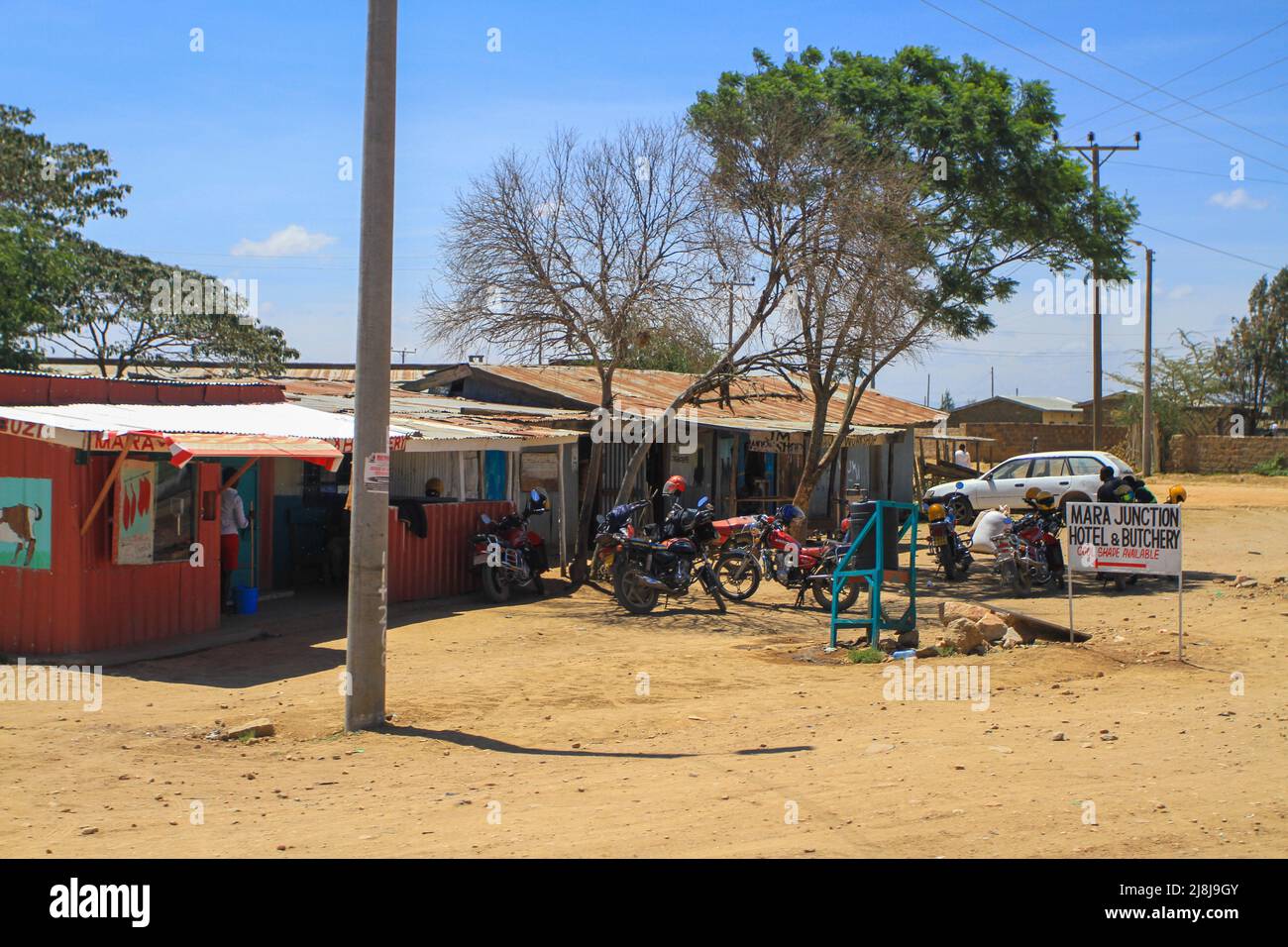 Motorcycles at Mara Junction near entrance road to Maasai Mara National ...