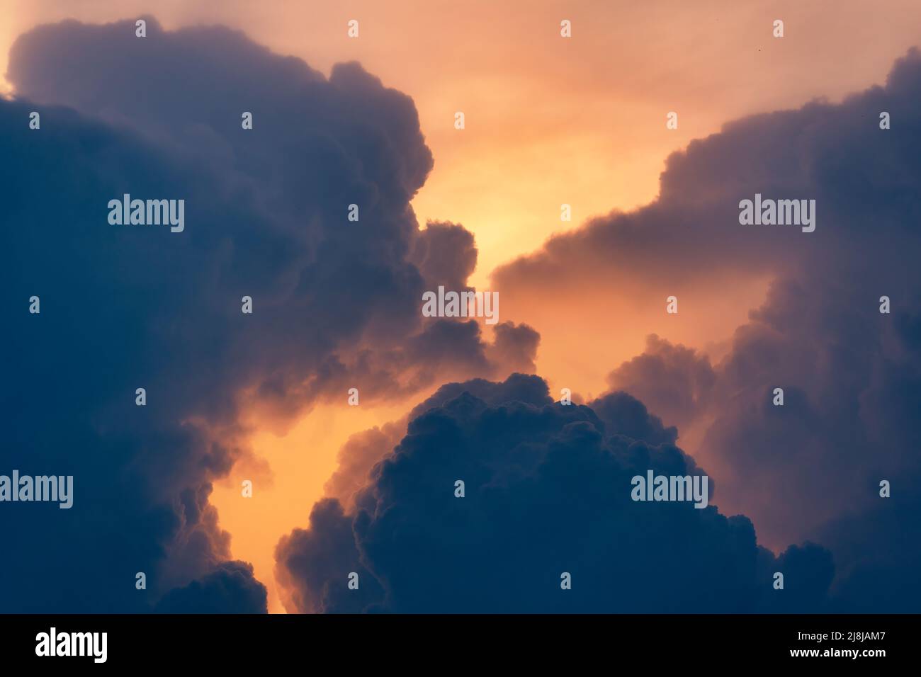 Beautiful dramatic sky and cumulus clouds in the sunset. Natural ...