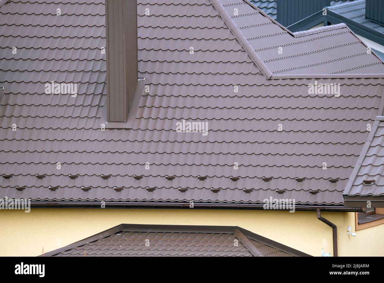 Snow guard for safety in winter on house roof top covered with steel ...