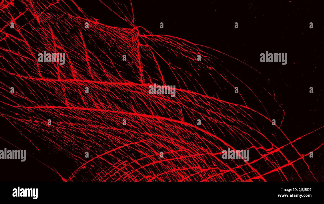 Red lines and scratches on a black background.Abstract red-black ...