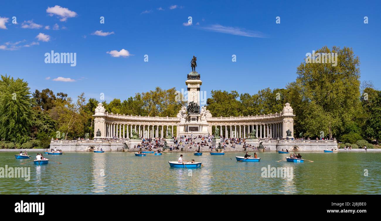 A picture of the El Retiro Lake and the Monument to Alfonso XII in the ...