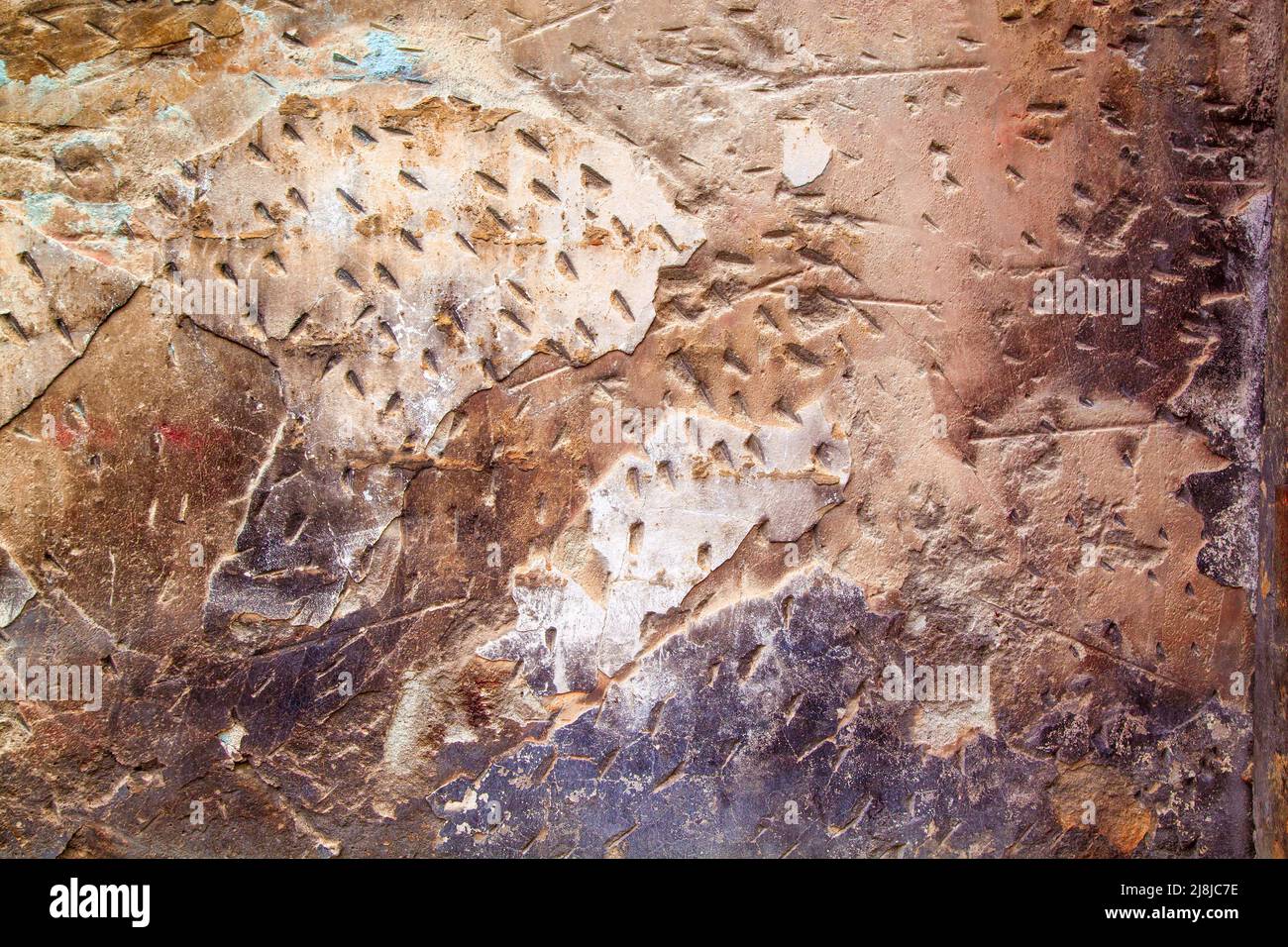 Unusual wall texture in an abandoned old building.Multicolor fantastic ...