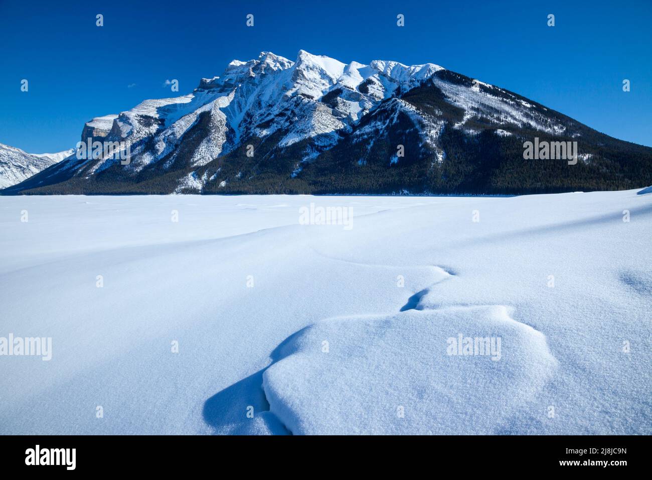 Winter at Lake Minnewanka in Banff National Park, Alberta, Canada Stock ...